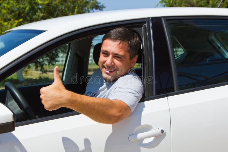 Smiling driver stock image. Image of inside, hand, vehicle - 32692679