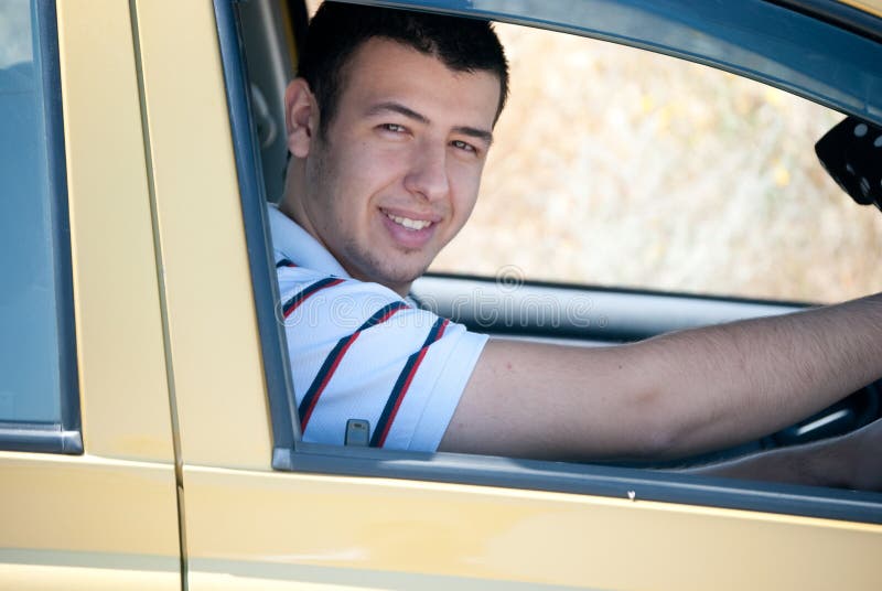 Smiling while driving stock photo. Image of drive, owner - 19714208