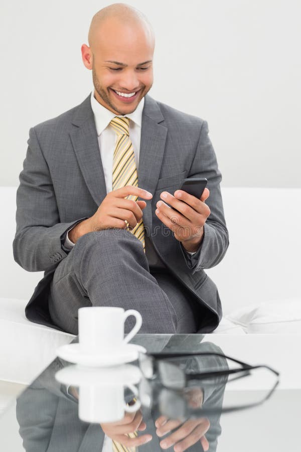 Smiling Elegant Businessman Text Messaging Stock Photo - Image of ...