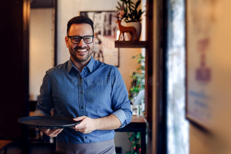 Smiling Elegant Waiter is Holding a Tray Stock Image - Image of drink ...