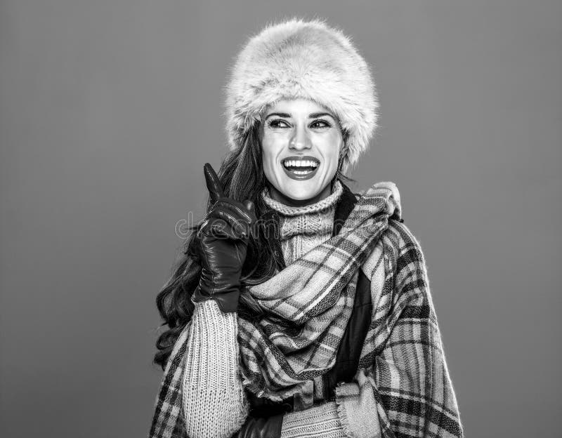 Smiling Elegant Woman in Fur Hat Isolated on Cold Blue Got Idea Stock ... Smiling Elegant Woman in Fur Hat Isolated on Cold Blue Got Idea Stock ...