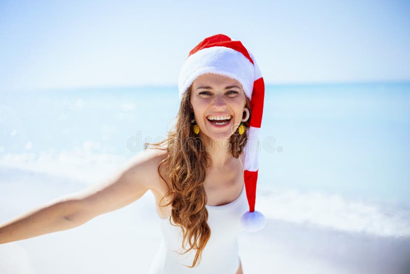 Smiling Elegant Woman in Swimwear Having Fun Time at Beach Stock Photo ... Smiling Elegant Woman in Swimwear Having Fun Time at Beach Stock Photo ...