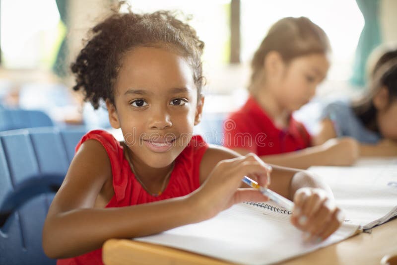 Elementary School Kids in Classroom Stock Image - Image of american ...