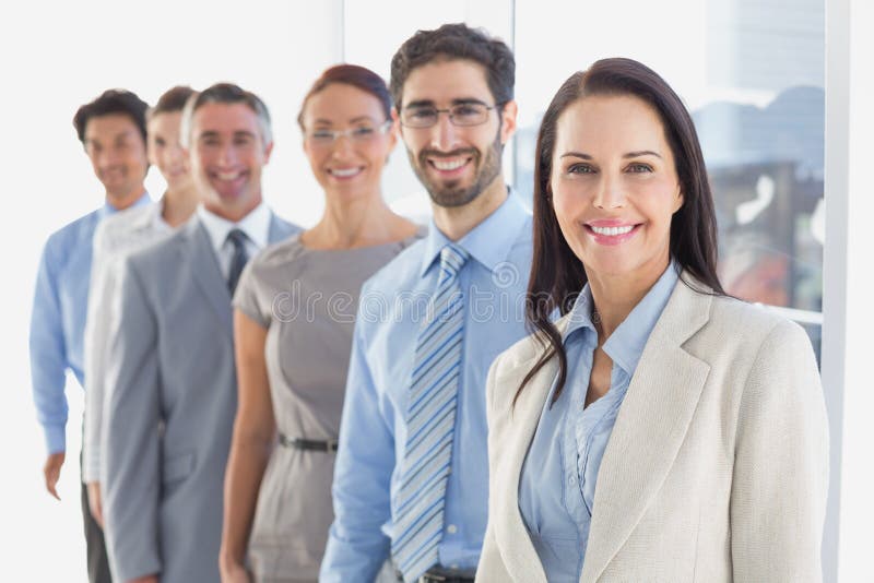 Smiling Employees in a Line Stock Image - Image of looking, camera ...