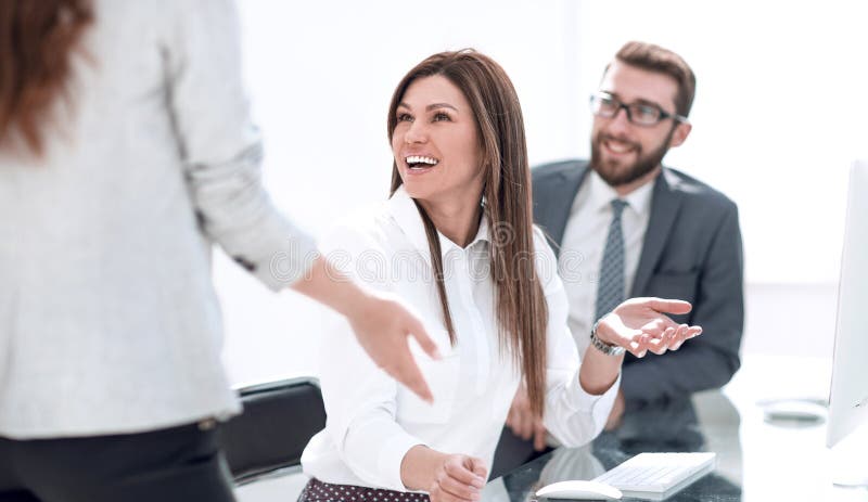 Smiling Employees Talking in the Workplace. Stock Image - Image of ...