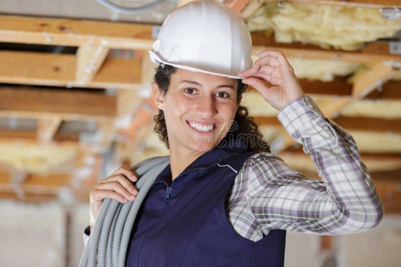 Smiling Engineer in Hardhat Working in Construction Site Stock Photo ...