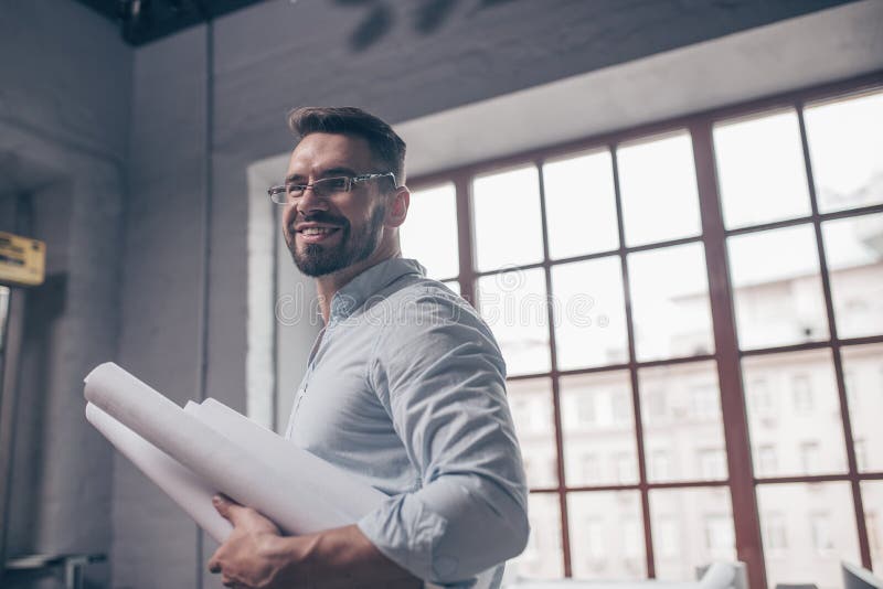 Smiling engineer in studio stock photo. Image of white - 121485730