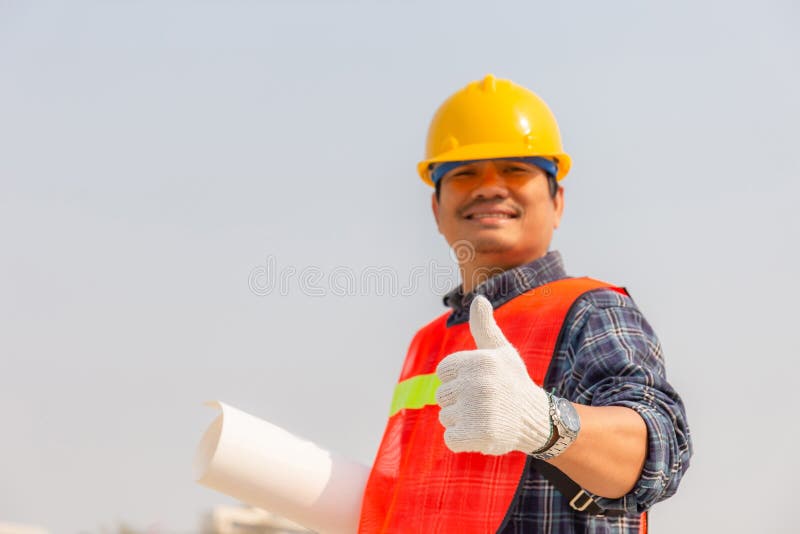 Smiling Engineer, Worker Man Holding Blueprint with Giving Thumb Up at ...