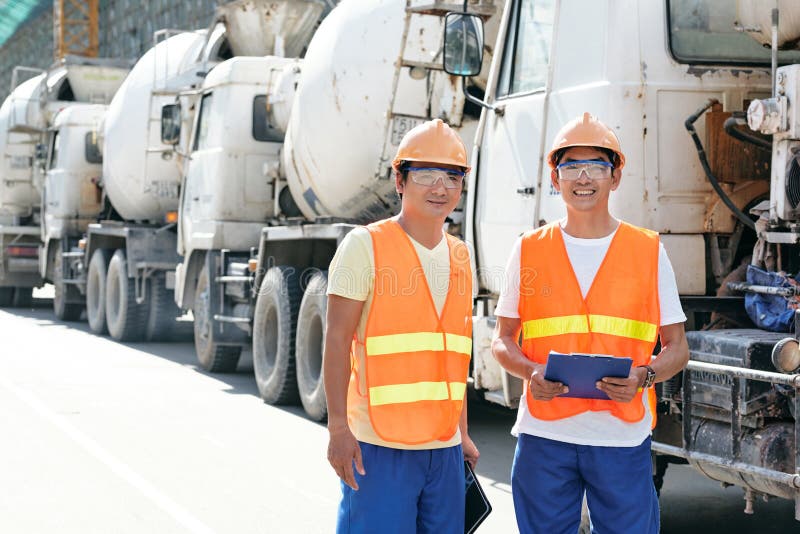 Smiling engineers at site stock photo. Image of portrait - 132232386