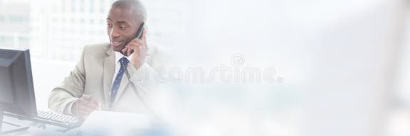 Smiling Entrepreneur Making Phone Call while Looking at Computer Stock ...