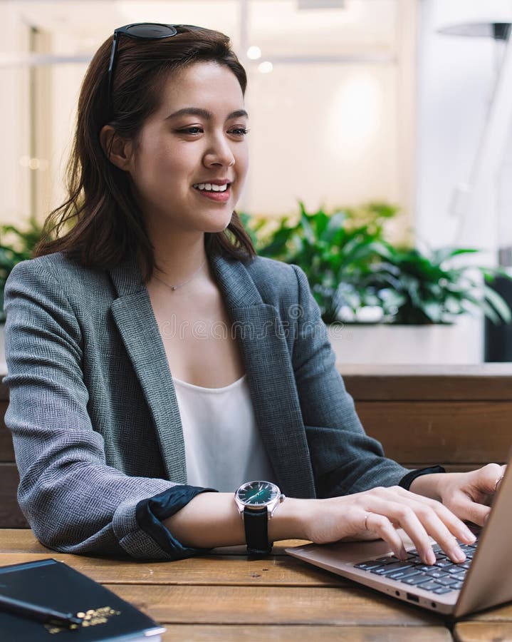 Smiling Ethnic Female Using Laptop at Cafe Stock Photo - Image of ...
