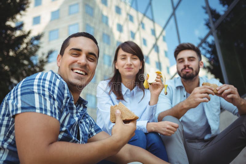 Smiling Executives Having Breakfast Outside Office Building Stock Image ...