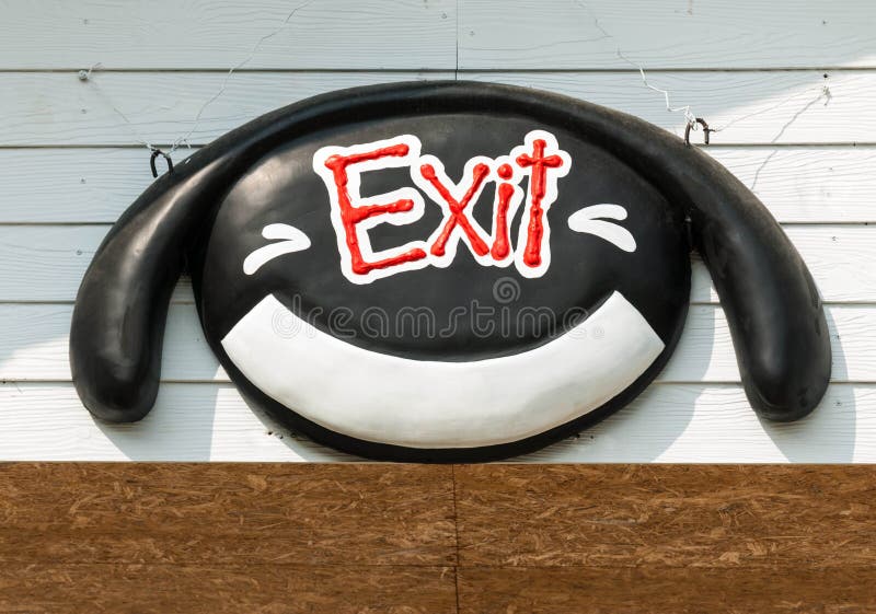 Smiling Face with Exit Sign Stock Photo - Image of industry, message ...