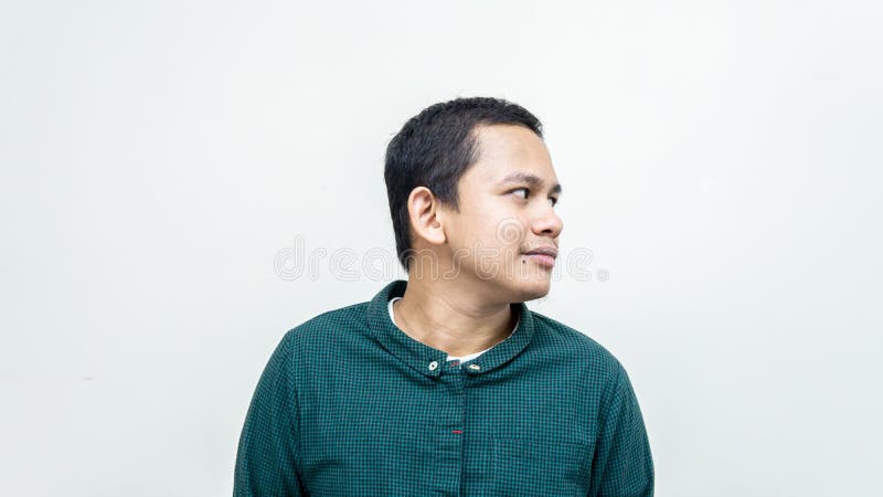 Smiling Face Expression of Young Asian Malay Man Looking at Empty Space ...