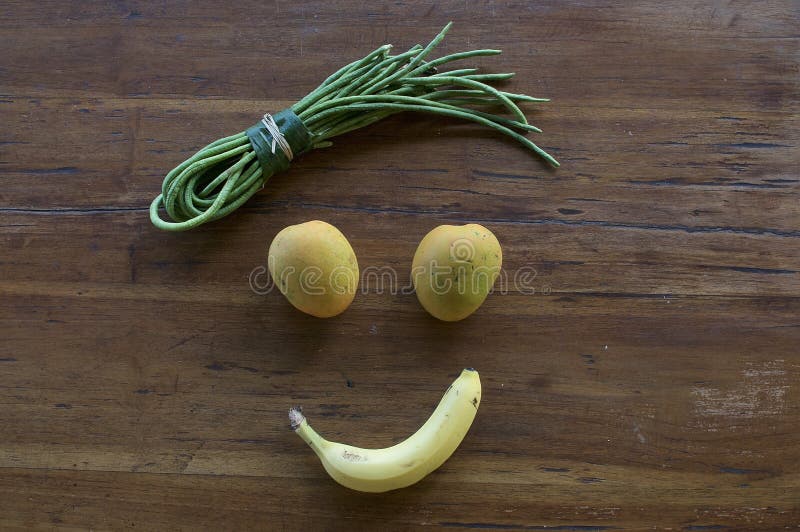 A Smiling Face Made Out of Vegetables and Fruits Stock Photo - Image of ...
