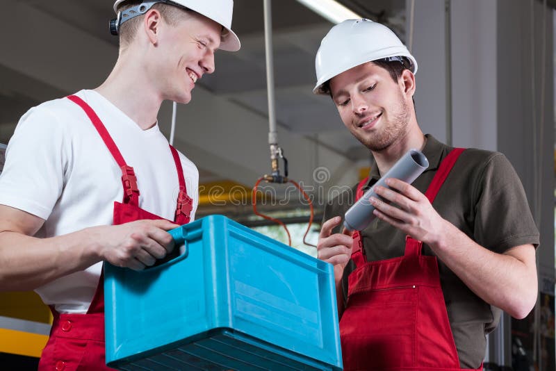 Smiling factory workers stock photo. Image of blue, company - 44262258