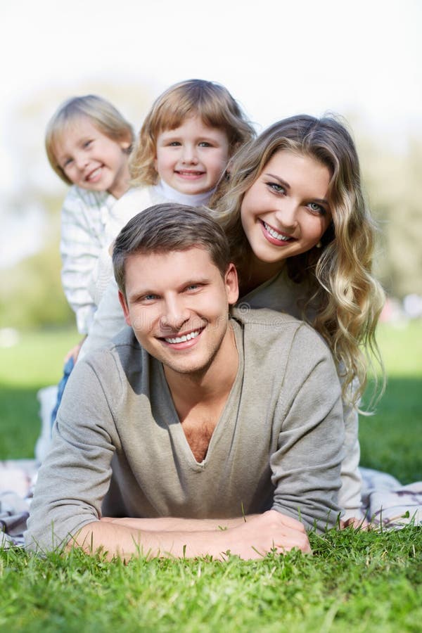 Smiling family stock image. Image of father, child, lifestyles - 27254199