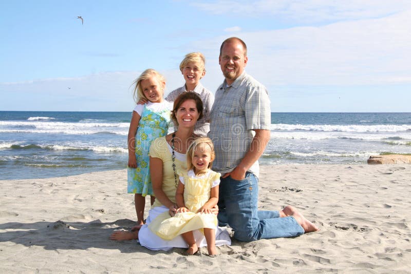 Smiling Family on the Beach Stock Photo - Image of children, summer ...