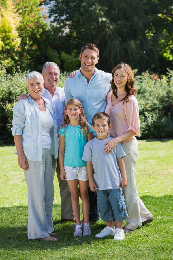 Smiling Family and Grandparents in the Park Stock Photo - Image of ...