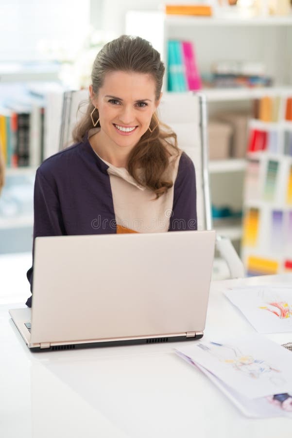 Smiling Fashion Designer Working on Laptop Stock Photo - Image of style ...