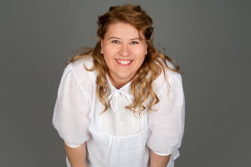 Smiling fat woman stock photo. Image of emotion, casual - 24978388