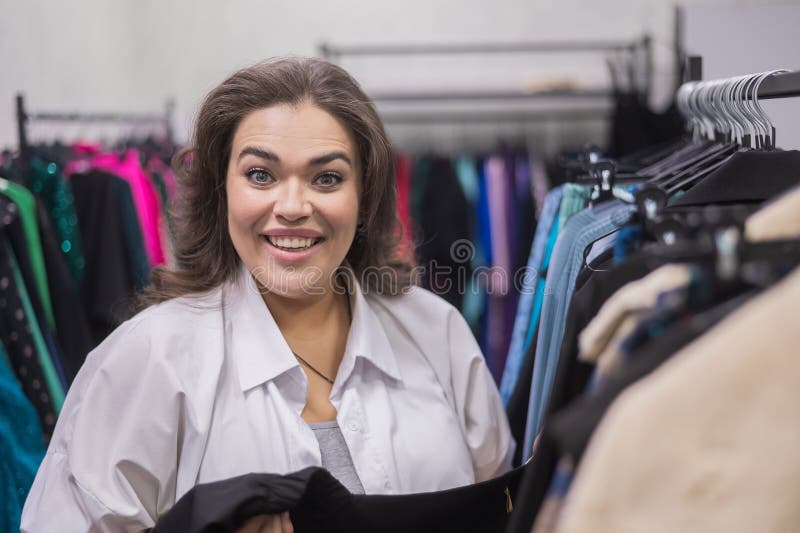 Smiling Fat Woman in Plus Size Store Looking at Camera. Stock Image ...