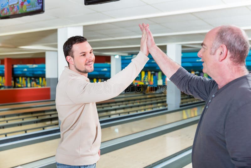 Smiling Father and Son Giving High-five Stock Photo - Image of happy ...
