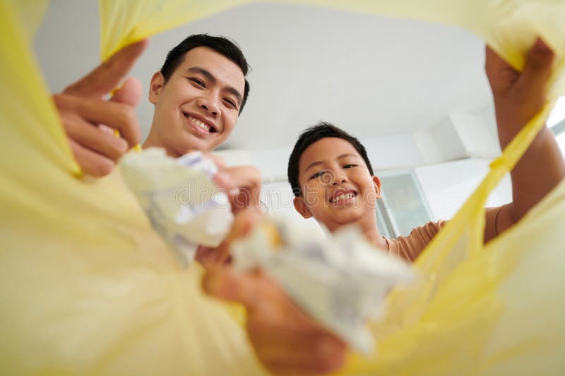 Father and Son Sorting Waste Stock Image - Image of teach, inside ...
