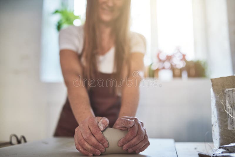 Smiling Female Artisan Molding Clay in Her Pottery Studio Stock Image ...