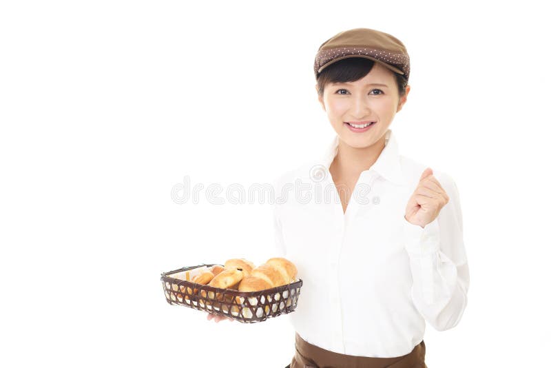 A smiling female baker stock image. Image of cuisine - 133652323