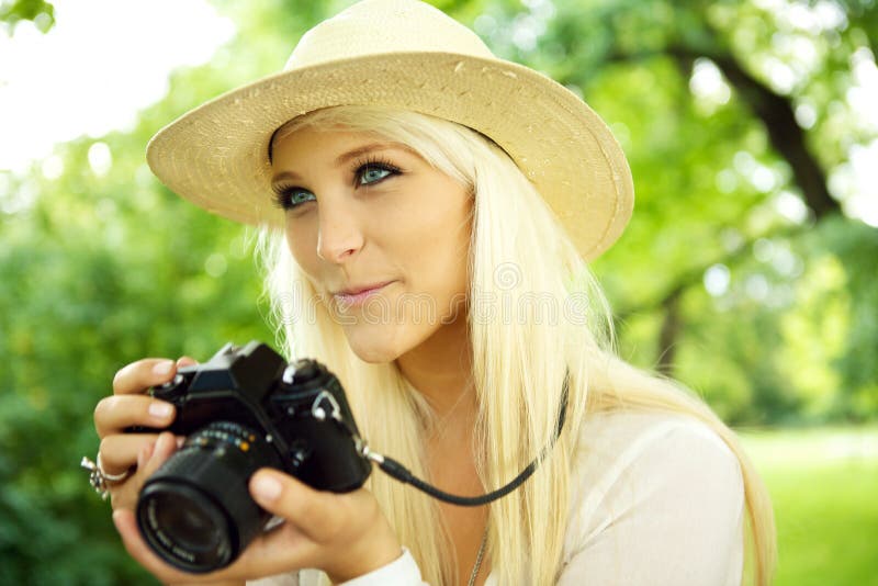 Smiling Female with a Camera Stock Photo - Image of enjoying, hobby ...