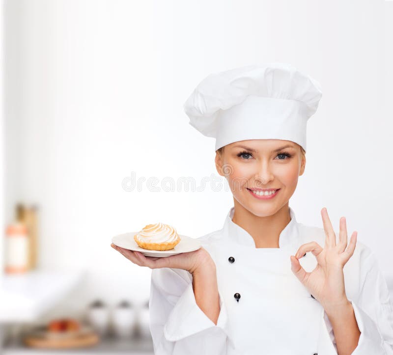 Smiling Female Chef with Cake on Plate Stock Image - Image of okay ...
