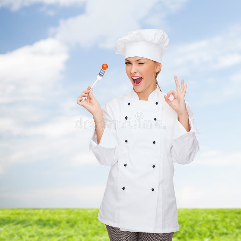 Smiling Female Chef with Fork and Tomato Stock Image - Image of ...