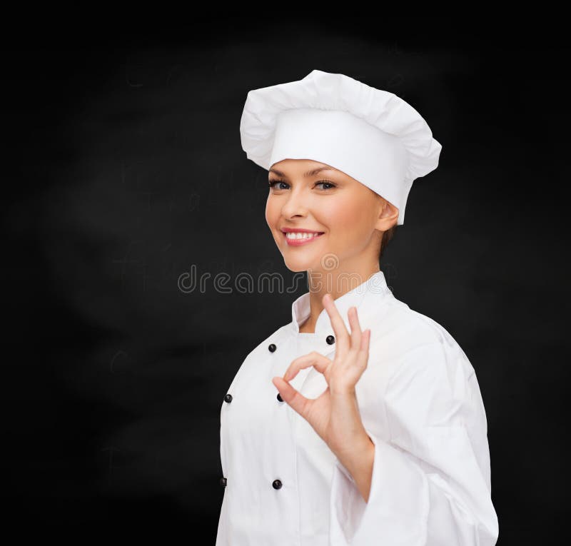 Smiling Female Chef Showing Ok Hand Sign Stock Photo - Image of food ...