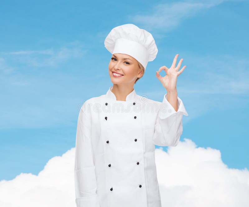 Smiling Female Chef Showing Ok Hand Sign Stock Photo - Image of ...