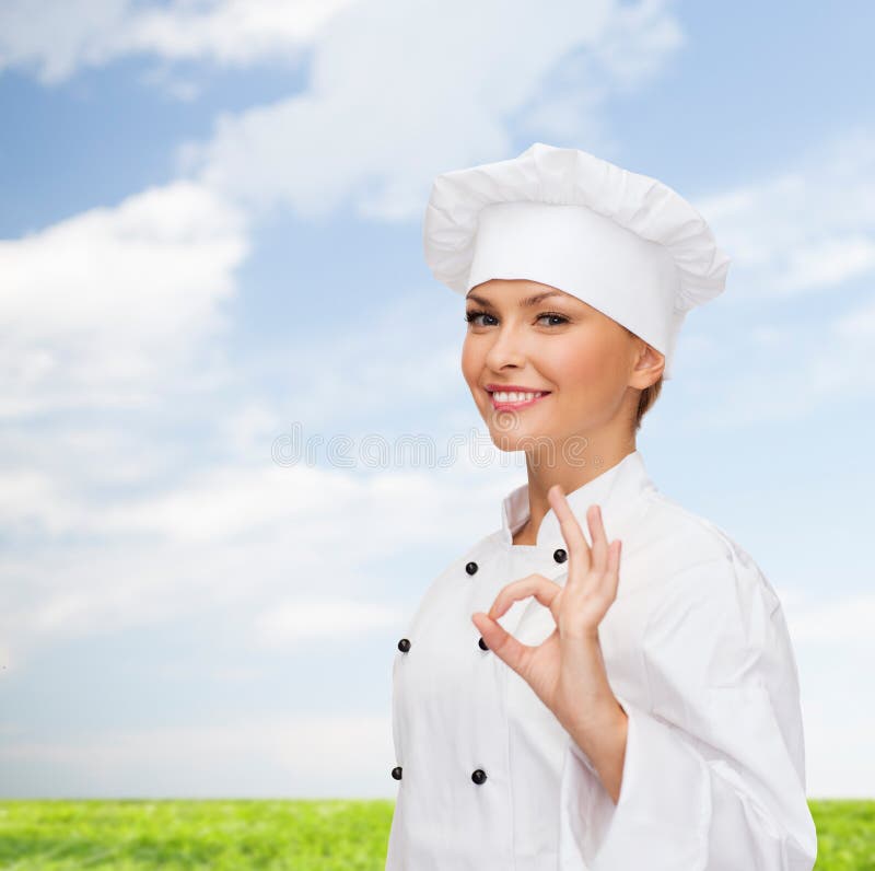 Smiling Female Chef Showing Ok Hand Sign Stock Photo - Image of hotel ...