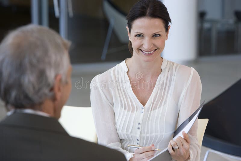 Smiling female consultant stock image. Image of brunette - 4085869