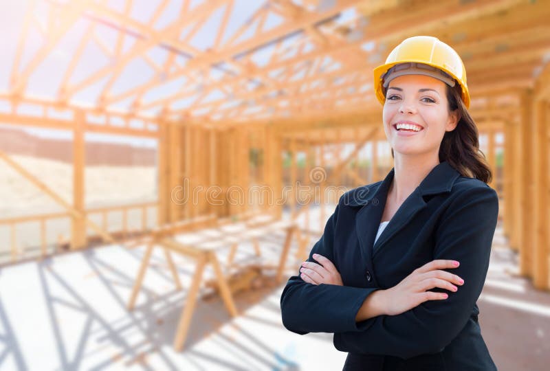 Smiling Female Contractor in Hard Hat at Construction Site Stock Image ...