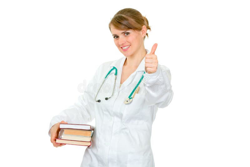 Smiling Female Doctor Holding Several Books Stock Photo - Image of ...