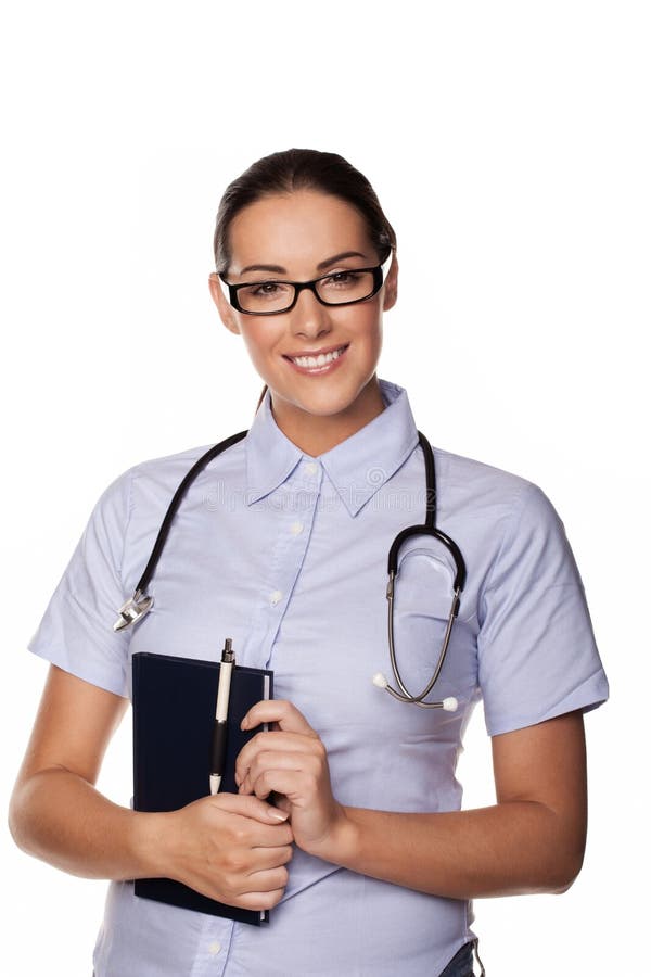 Smiling Female Doctor with Notepad Stock Photo - Image of stethoscope ...