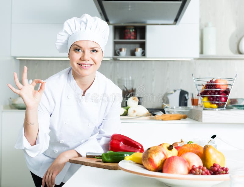 Smiling Female Kitchener in Uniform is Standing in the Kitchen Stock ...