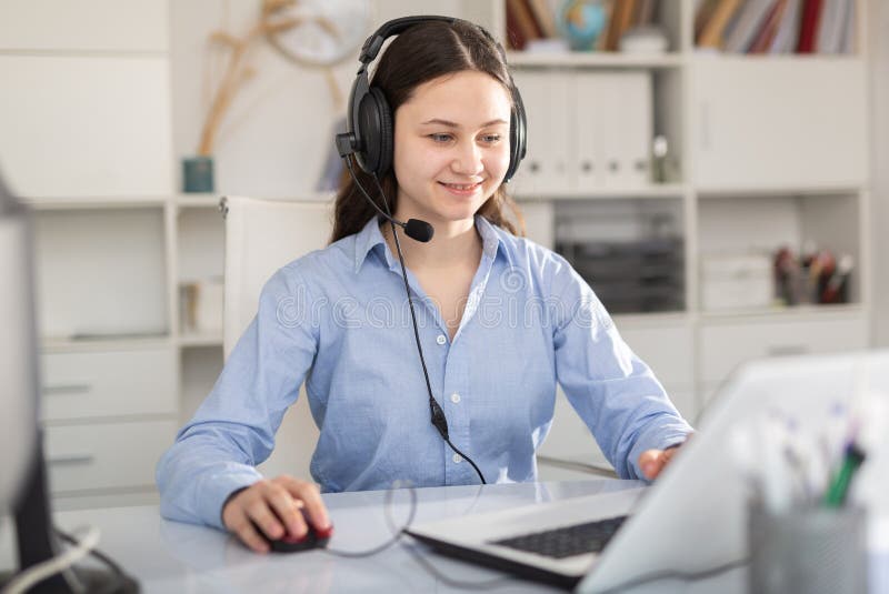 Smiling Female Operator Talking with Customer Using Headset Company ...