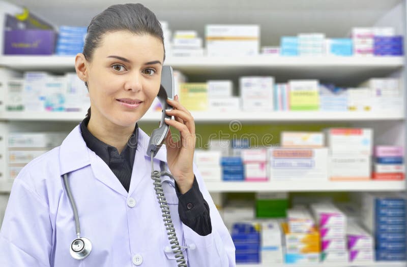 Pharmacist Reading Prescription at Pharmacy Stock Photo - Image of ...