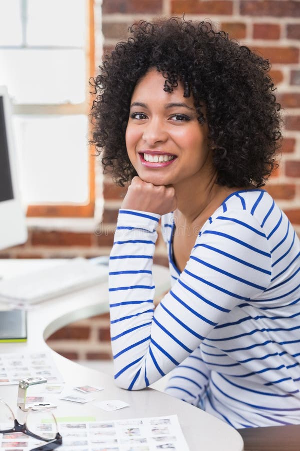 Smiling Female Photo Editor Using Computer in Office Stock Image ...