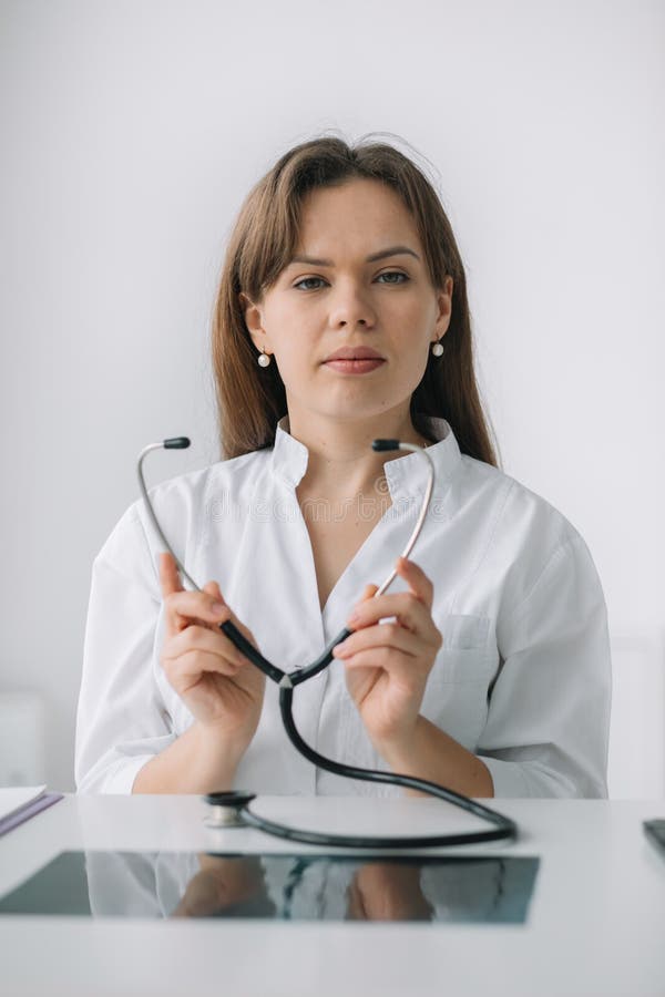 Smiling Female Physician Posing In Hospital Office Happy Young