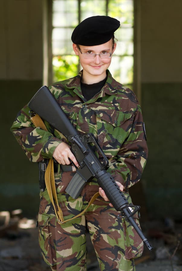Smiling Female Soldier with a Gun Stock Photo - Image of europe, guard ...
