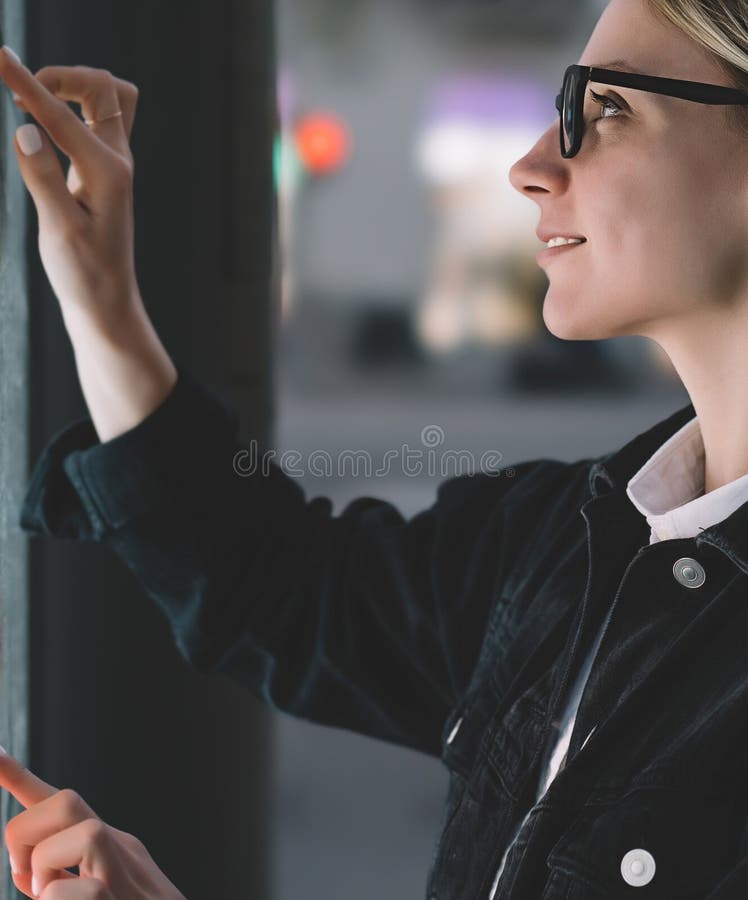Smiling Female Standing at Big Display with Advanced Digital Technology ...