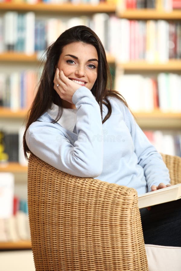 Female Student Reading a Book Stock Image - Image of smiling, learn ...