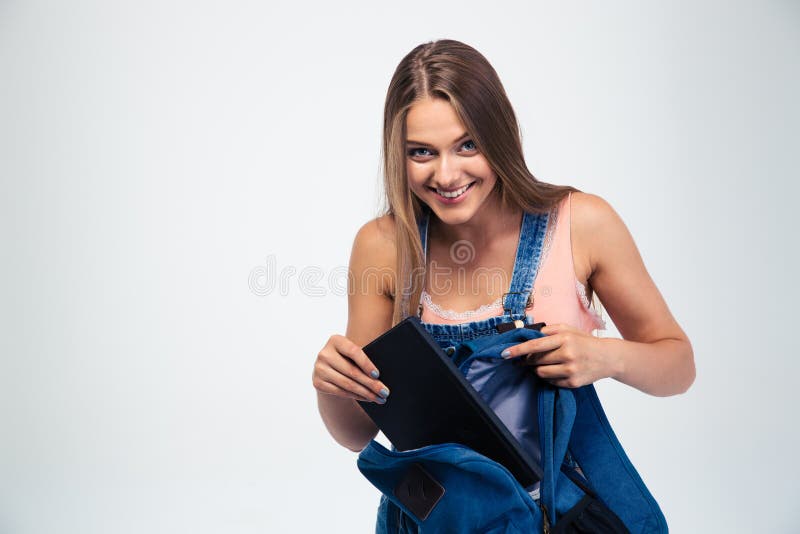 Student Putting Book Back Onto a Bookshelf Stock Photo - Image of ...