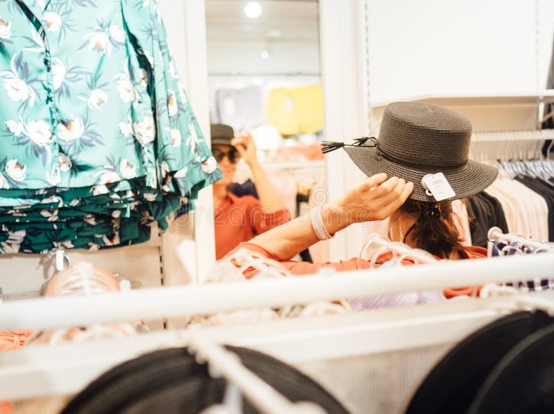 Smiling Female Try on the New Hat Look at Mirror Reflection. Stock ...